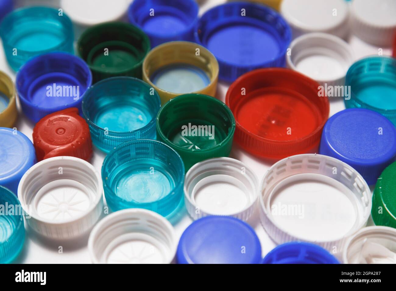Plastic caps background. Recycling concept Stock Photo - Alamy