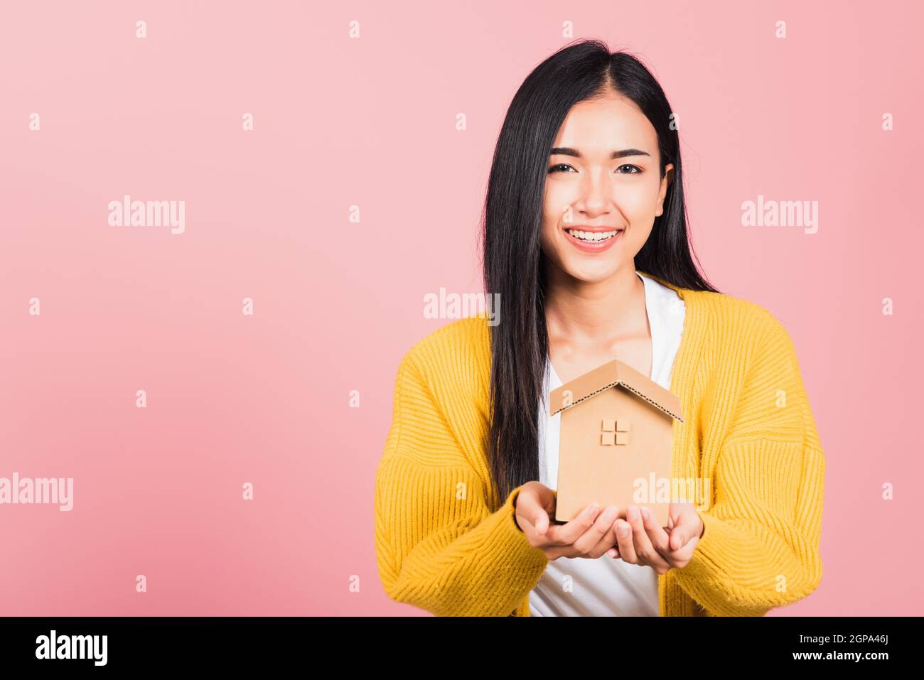 Happy Asian portrait beautiful cute young woman excited smiling holding ...
