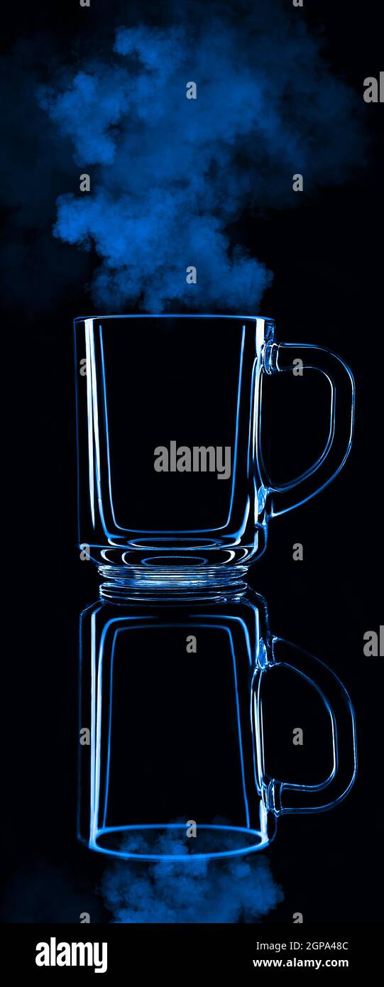 Just a glass on a black background with a reflection. Blue color, with ...