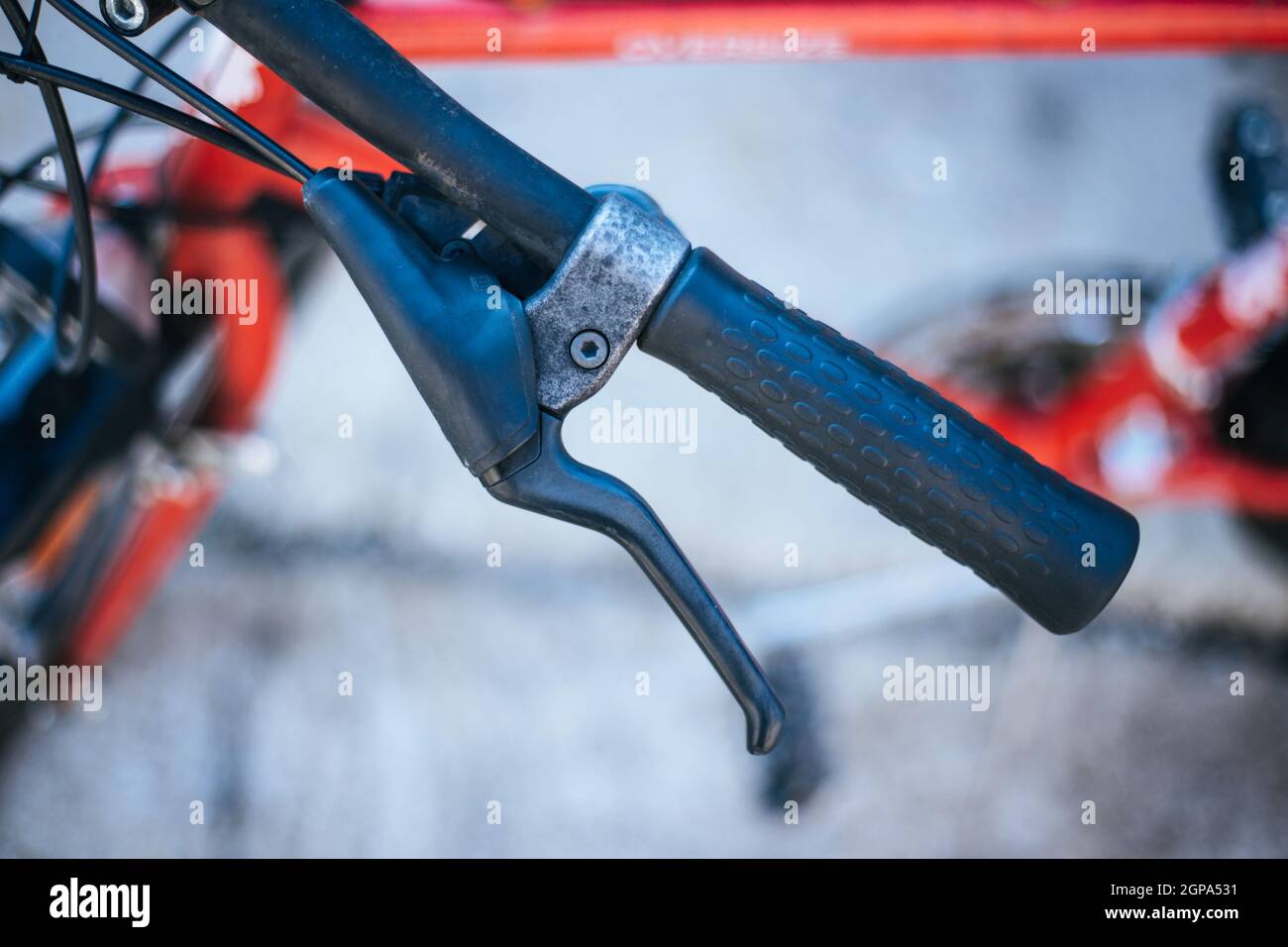 Closeup picture of a bicycle handlebar and breaks, bike repair, blurred ...