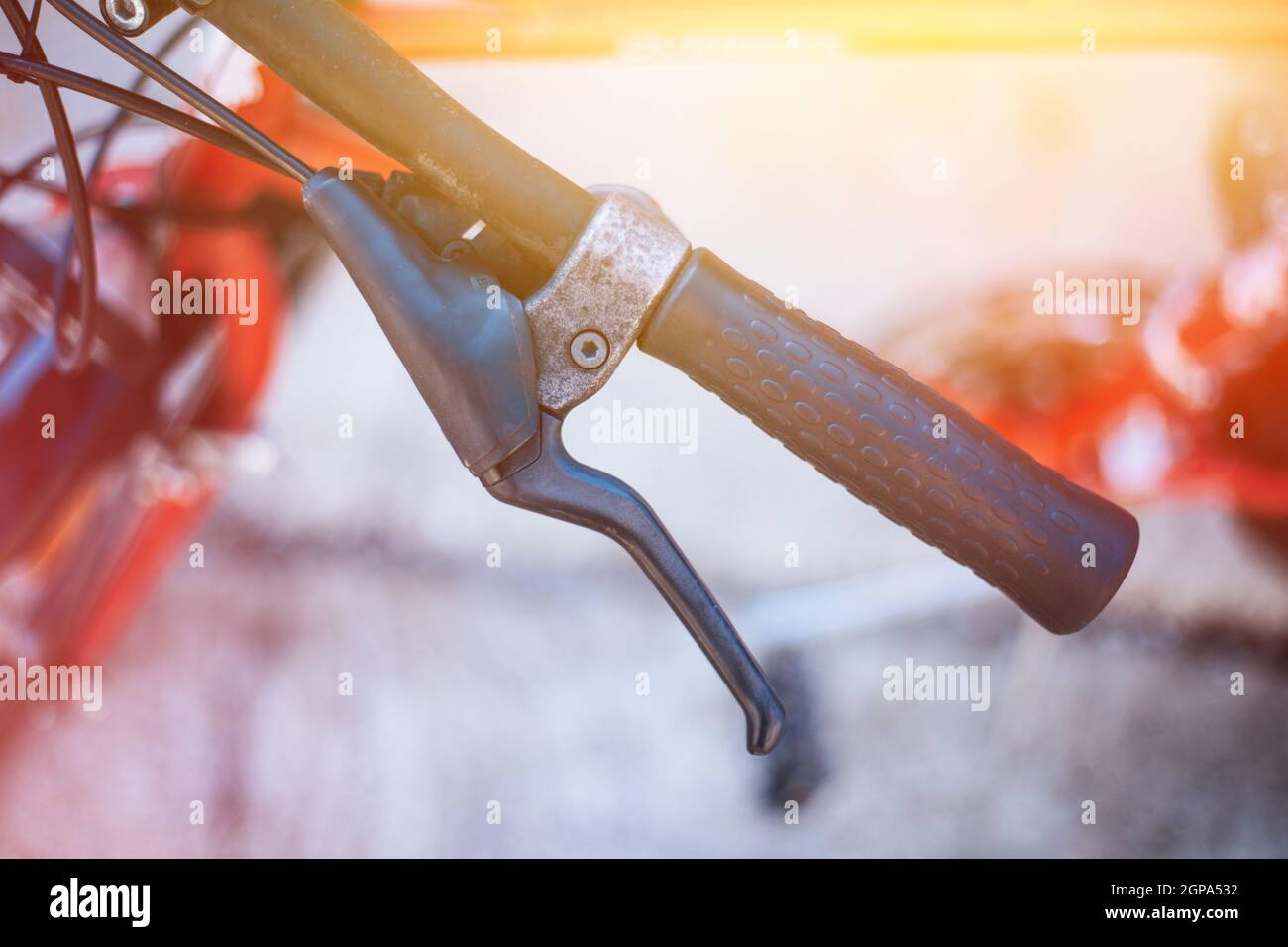 Closeup picture of a bicycle handlebar and breaks, bike repair, blurred ...