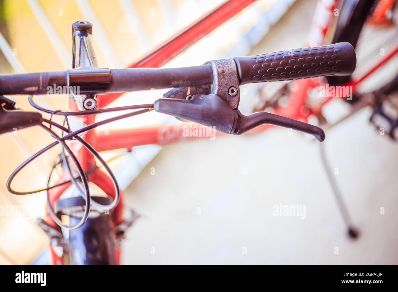 Closeup picture of a bicycle handlebar and breaks, bike repair, blurred ...