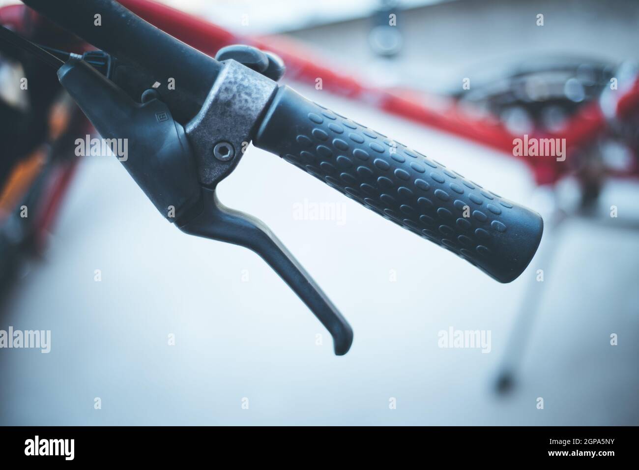 Closeup picture of a bicycle handlebar and breaks, bike repair, blurred ...