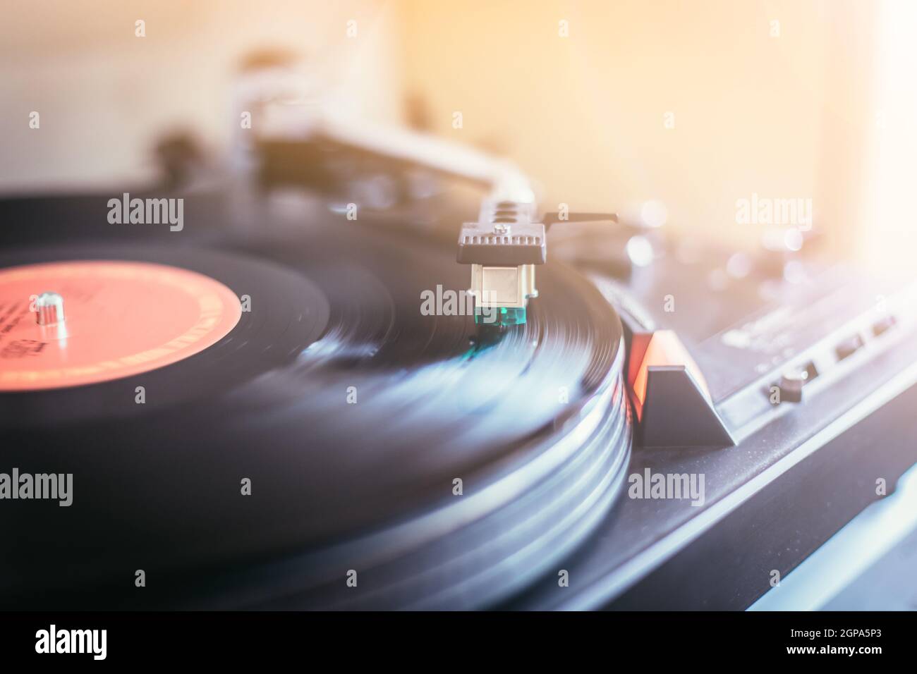 Close up picture of a record player, playing a record Stock Photo - Alamy