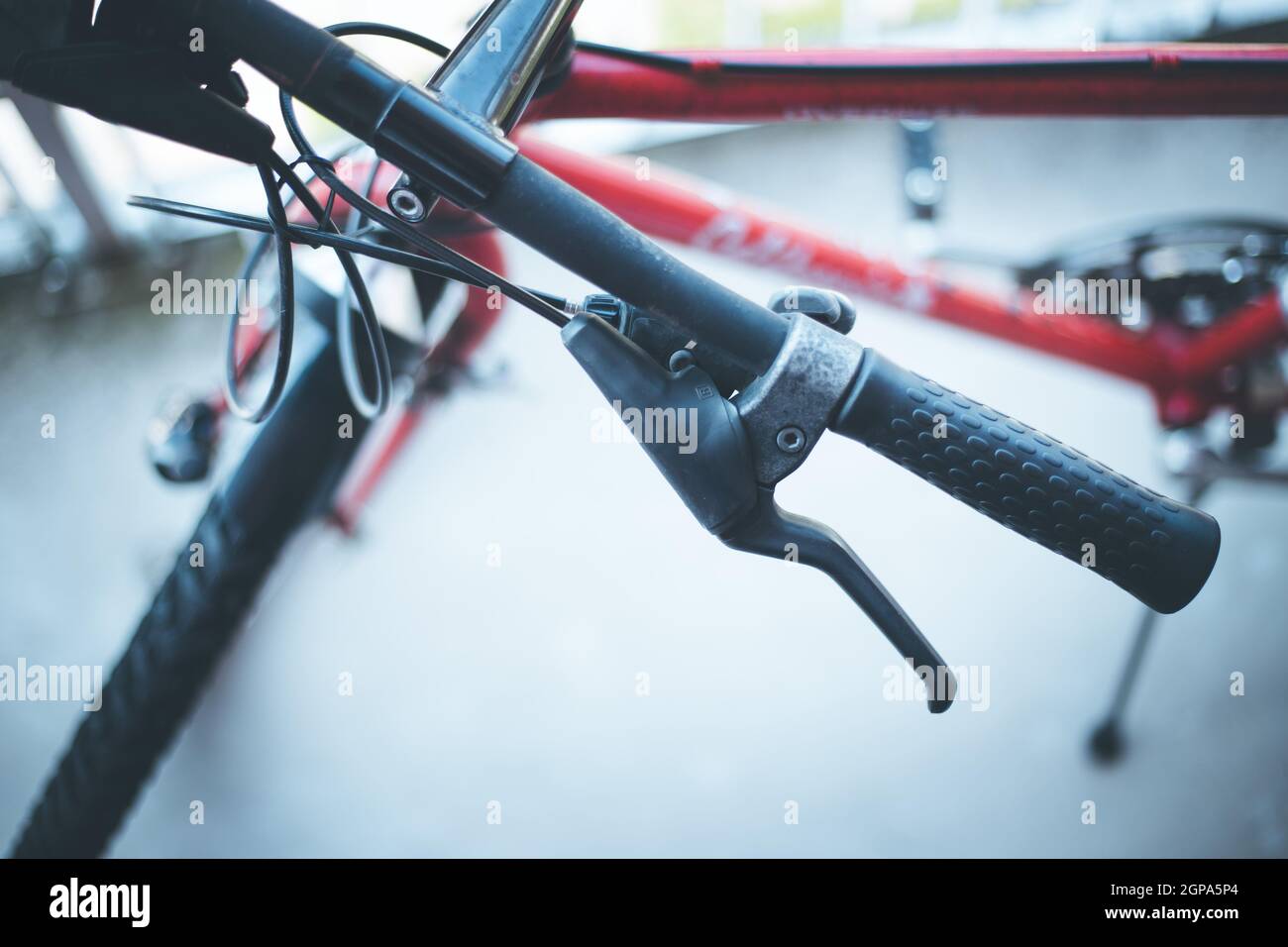 Closeup picture of a bicycle handlebar and breaks, bike repair, blurred ...