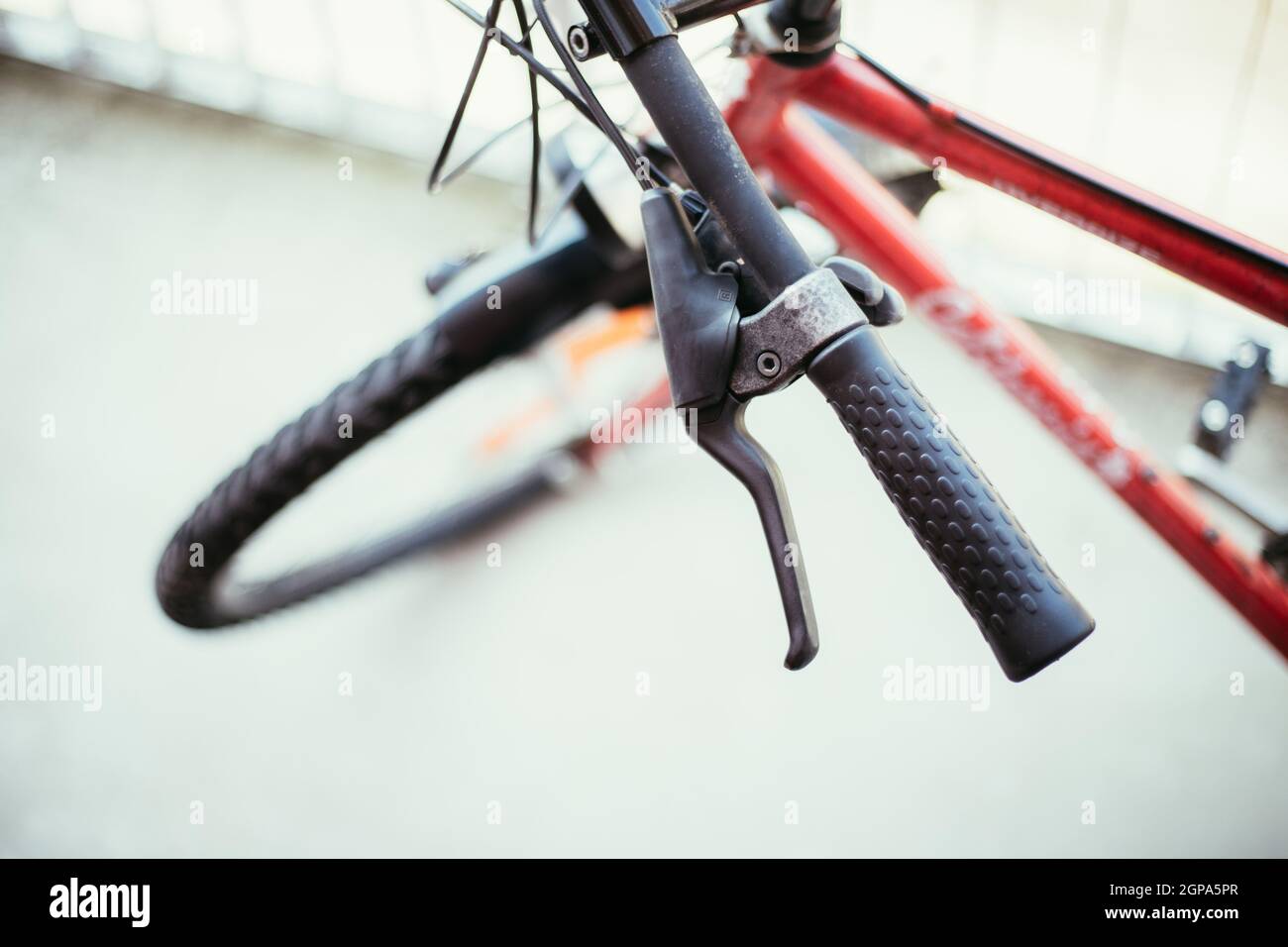 Closeup picture of a bicycle handlebar and breaks, bike repair, blurred ...