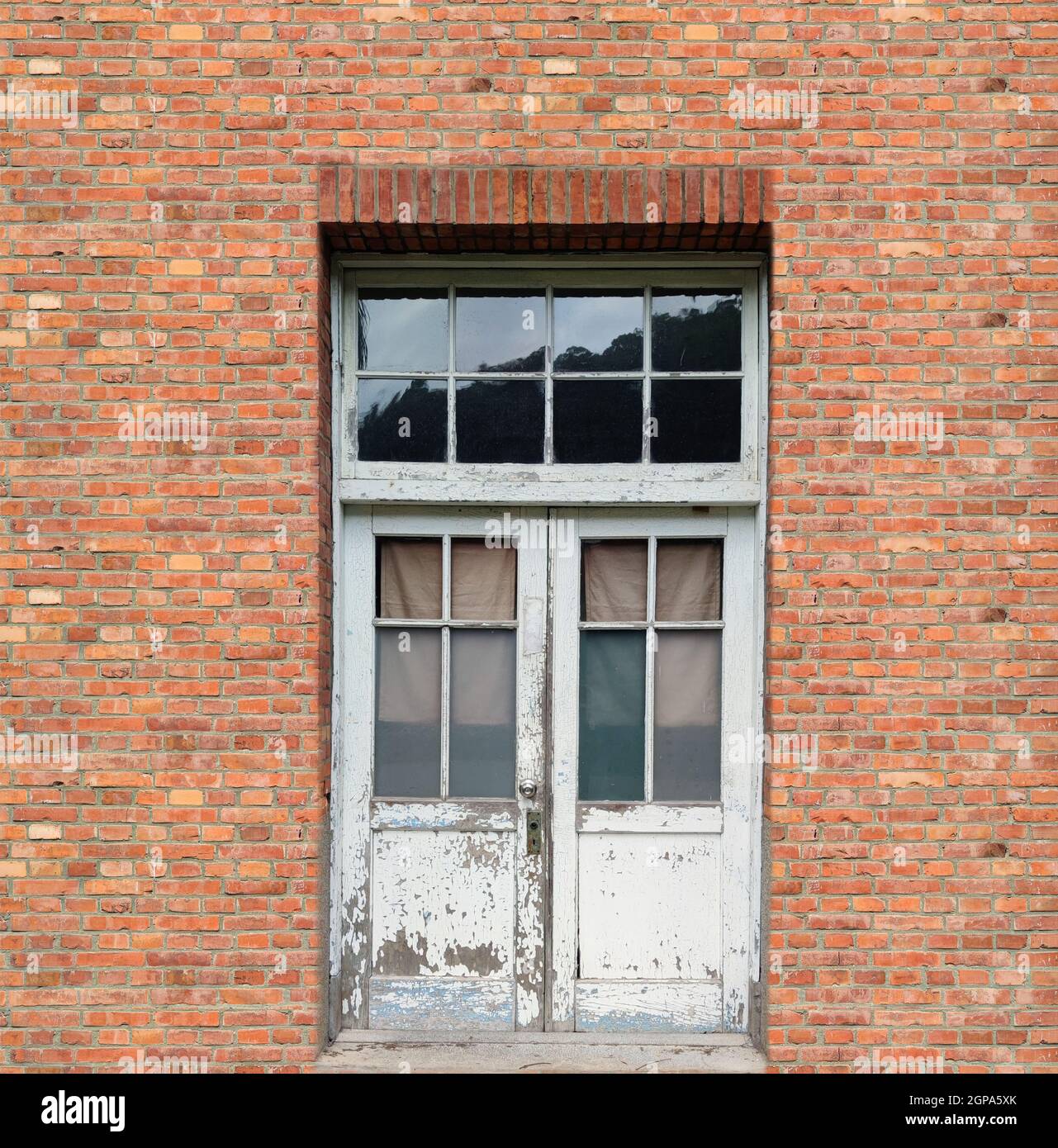 The White window at vintage red brick wall Stock Photo - Alamy