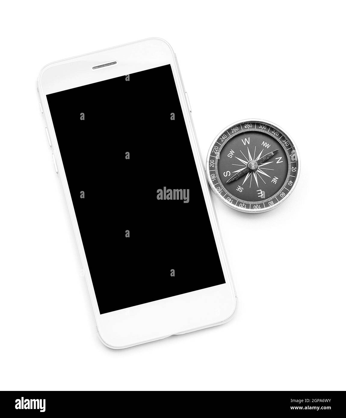 Mobile phone and compass on white background Stock Photo - Alamy