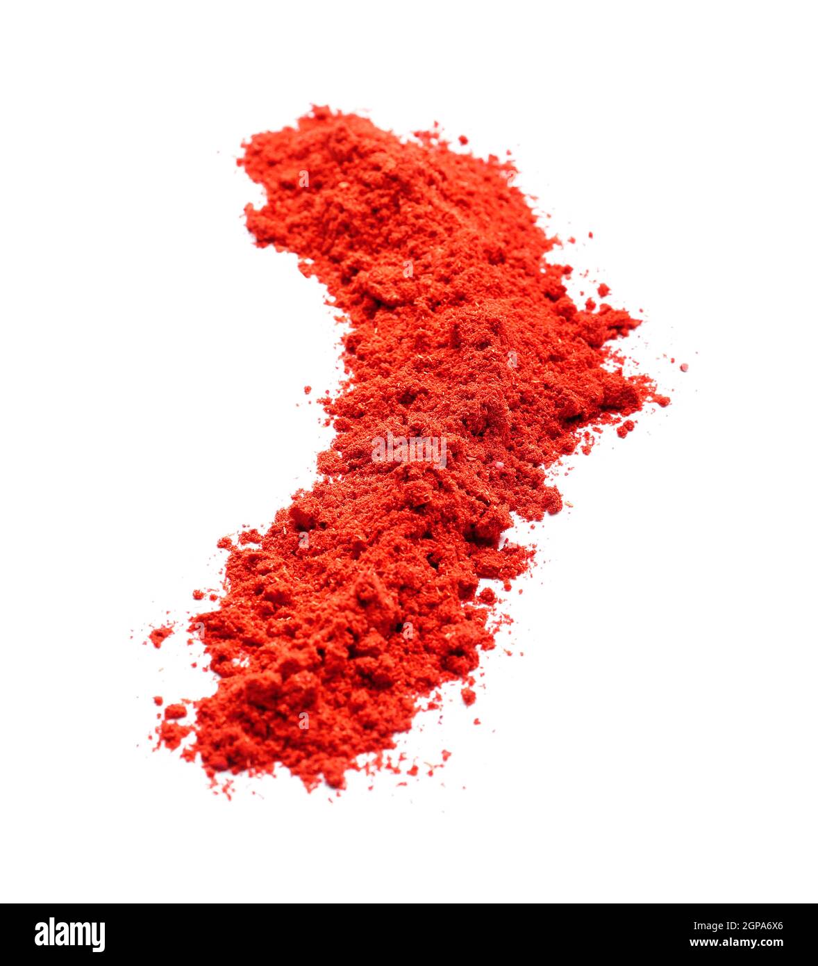Heap of red chili powder on white background Stock Photo - Alamy