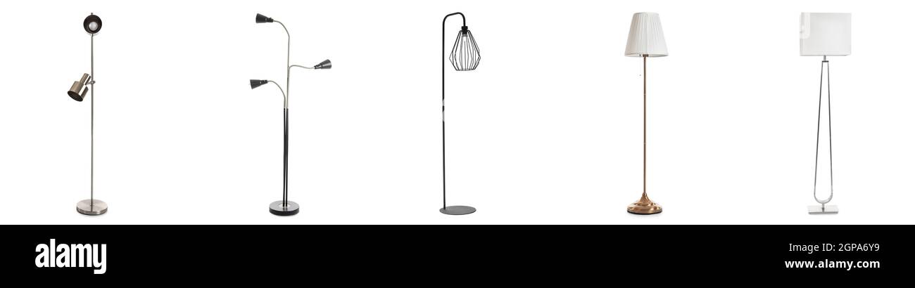 Stylish stand lamps on white background Stock Photo - Alamy