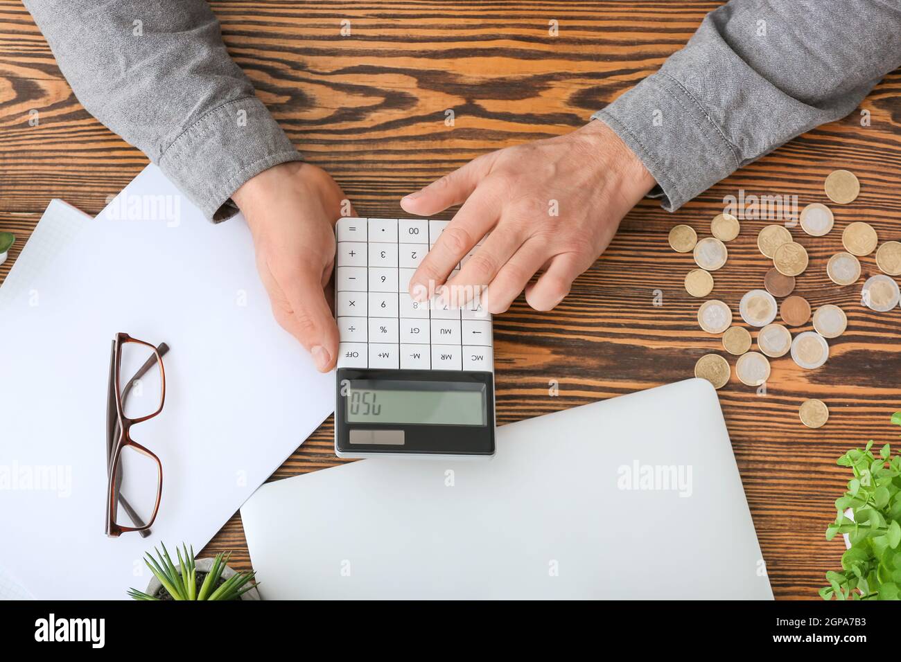 Person counting coins using hi-res stock photography and images - Alamy