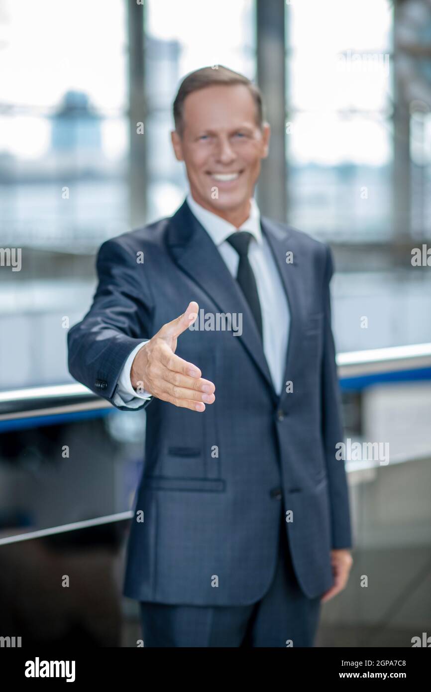 Holding out hand hi-res stock photography and images - Alamy