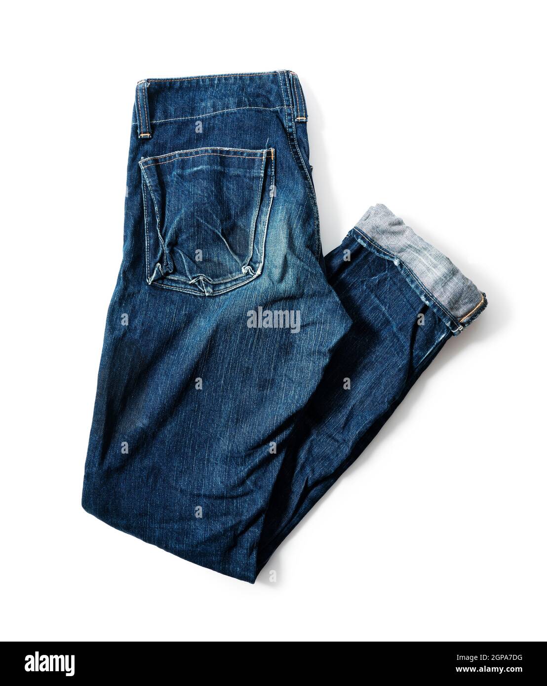 Blue jeans on a white background. View from above Stock Photo - Alamy