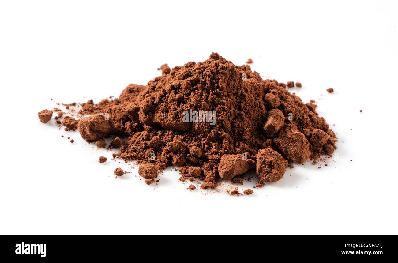 Cocoa powder placed on a white background. Side view Stock Photo - Alamy