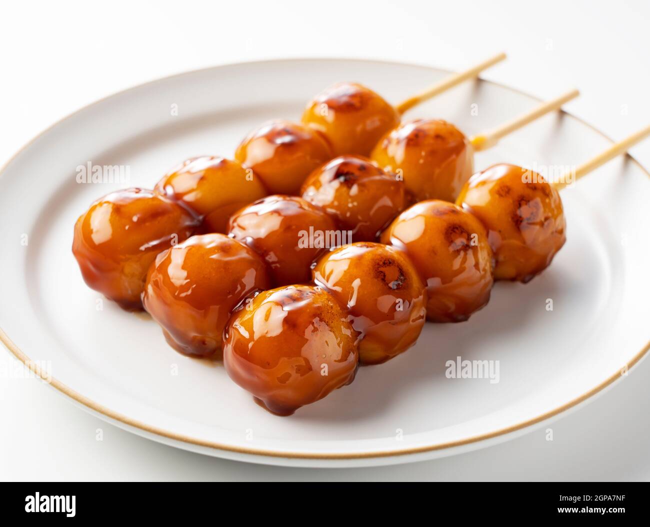 Mitarashi dango placed on a white background. Image of mitarashi dango ...