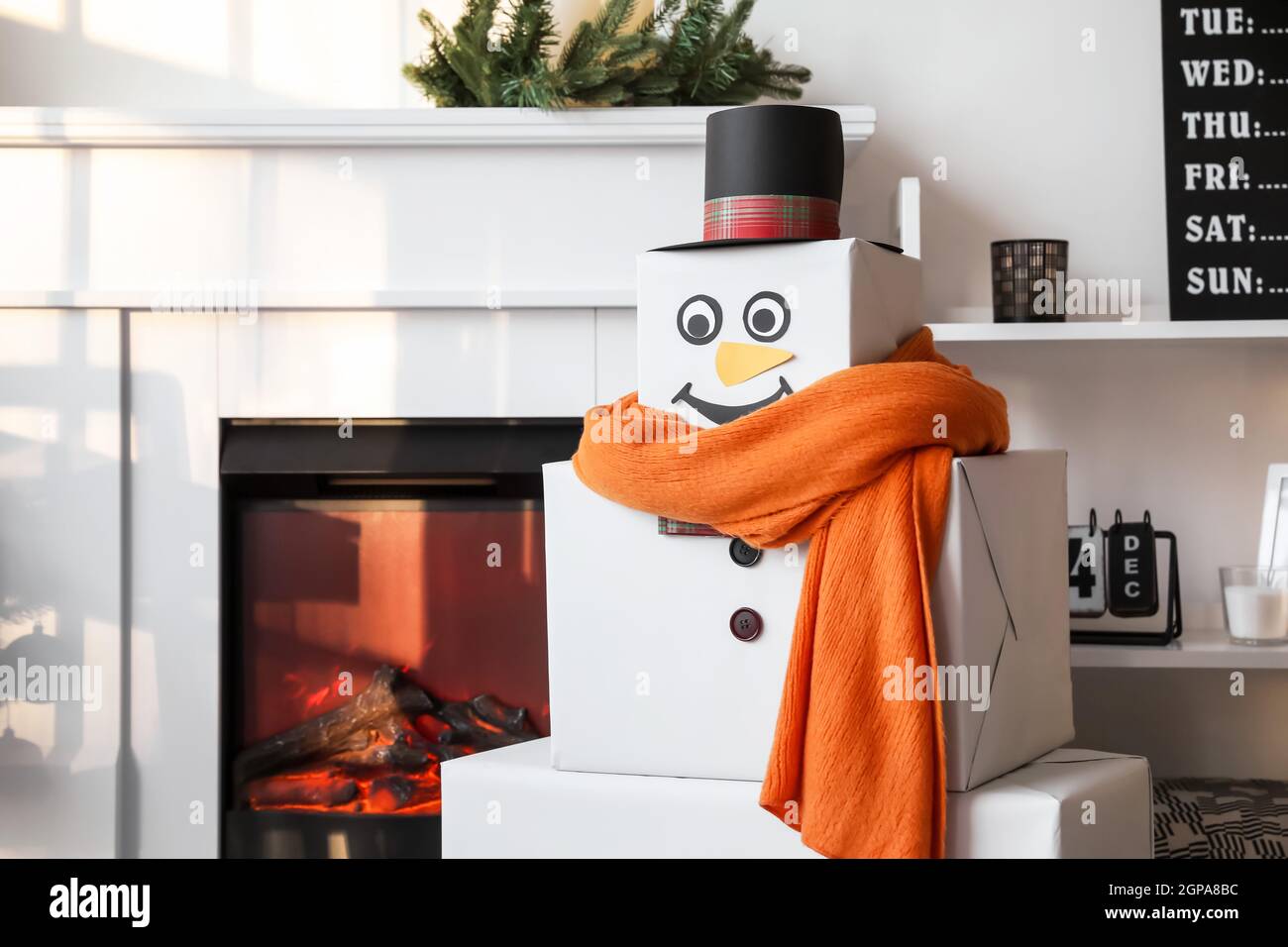 Funny decorative snowman in living room Stock Photo - Alamy