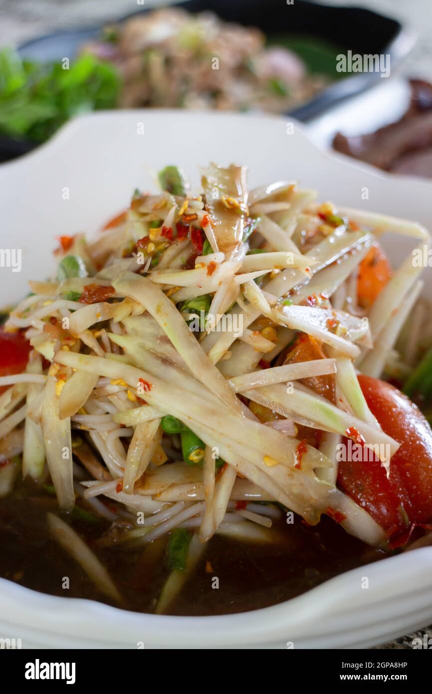 Spicy green papaya salad serve, stock photo Stock Photo - Alamy