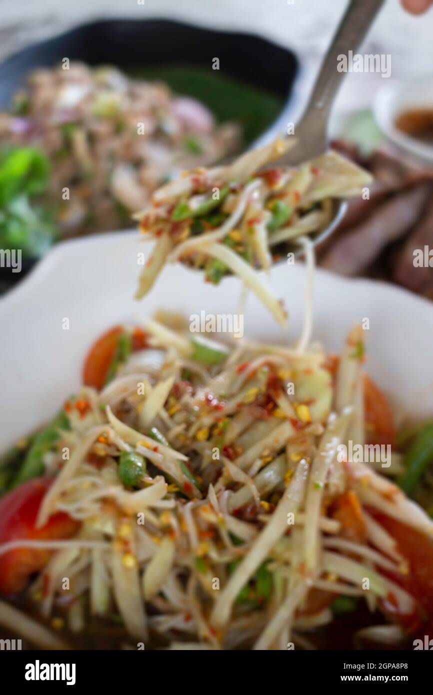 Spicy green papaya salad serve, stock photo Stock Photo - Alamy