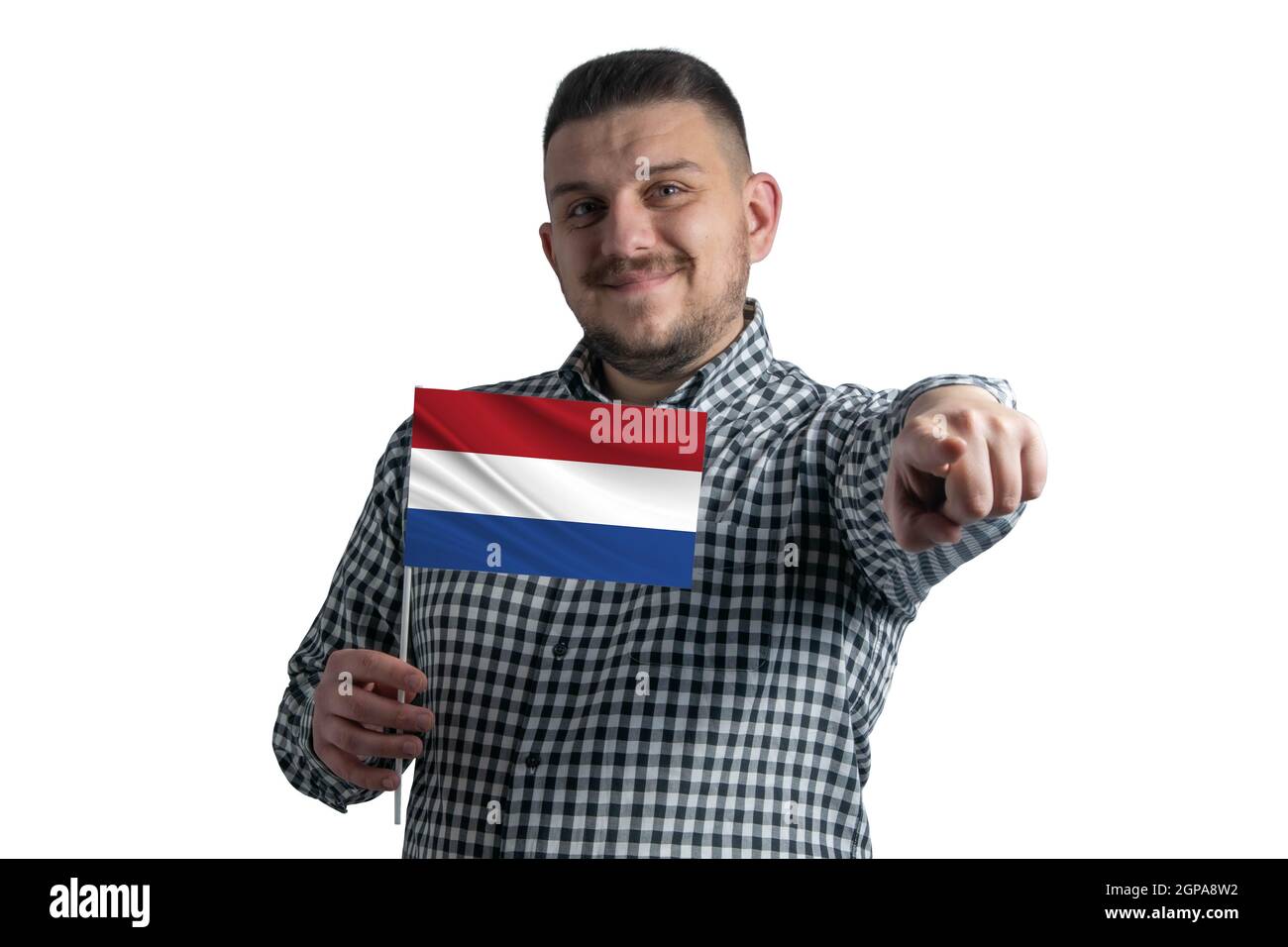 White guy holding a flag of Netherlands and points forward in front of ...