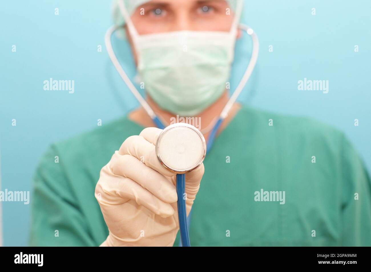 Young doctor surgeon orthopedist with breathing protection mask and ...