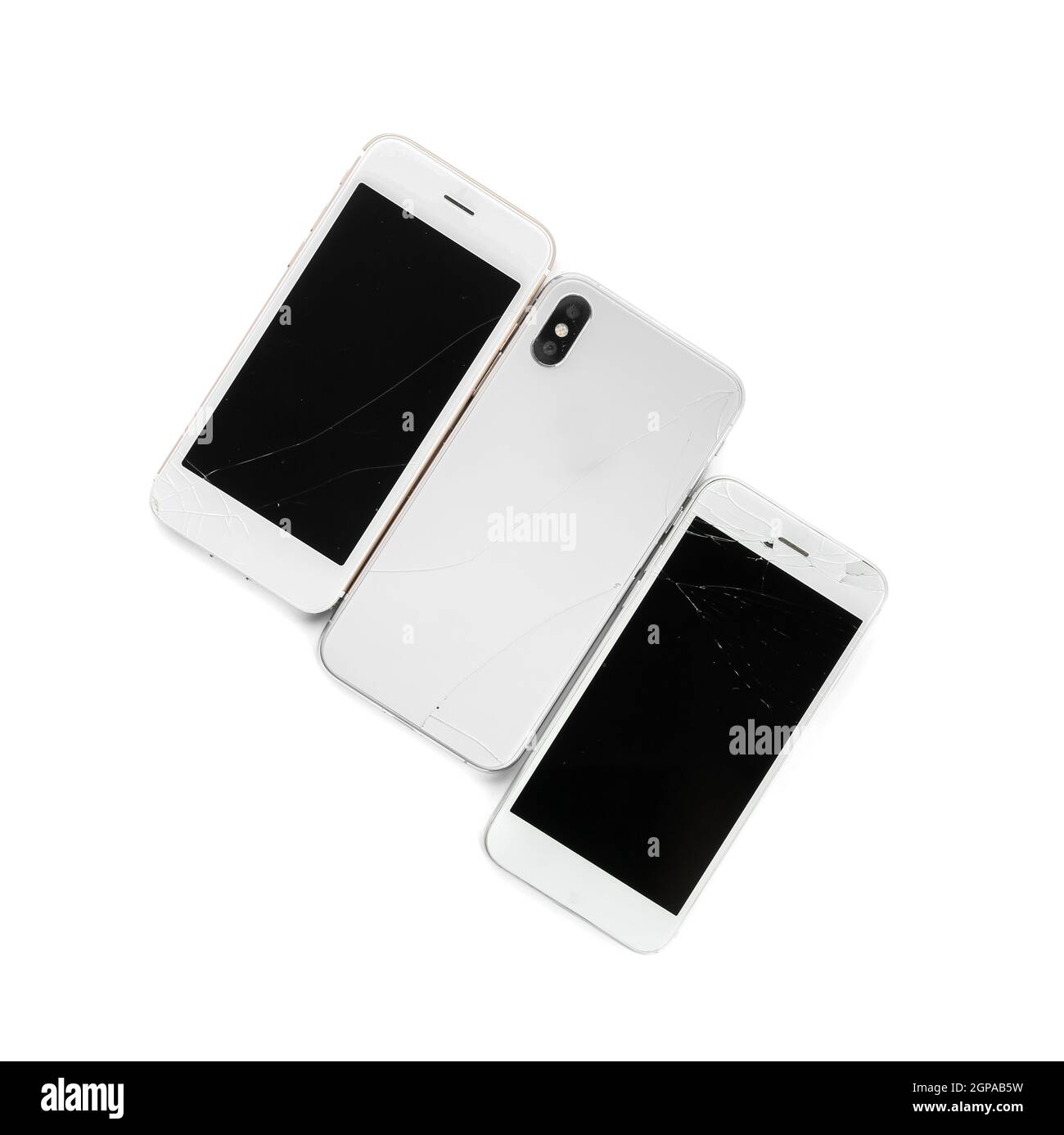 Broken mobile phones on white background Stock Photo - Alamy