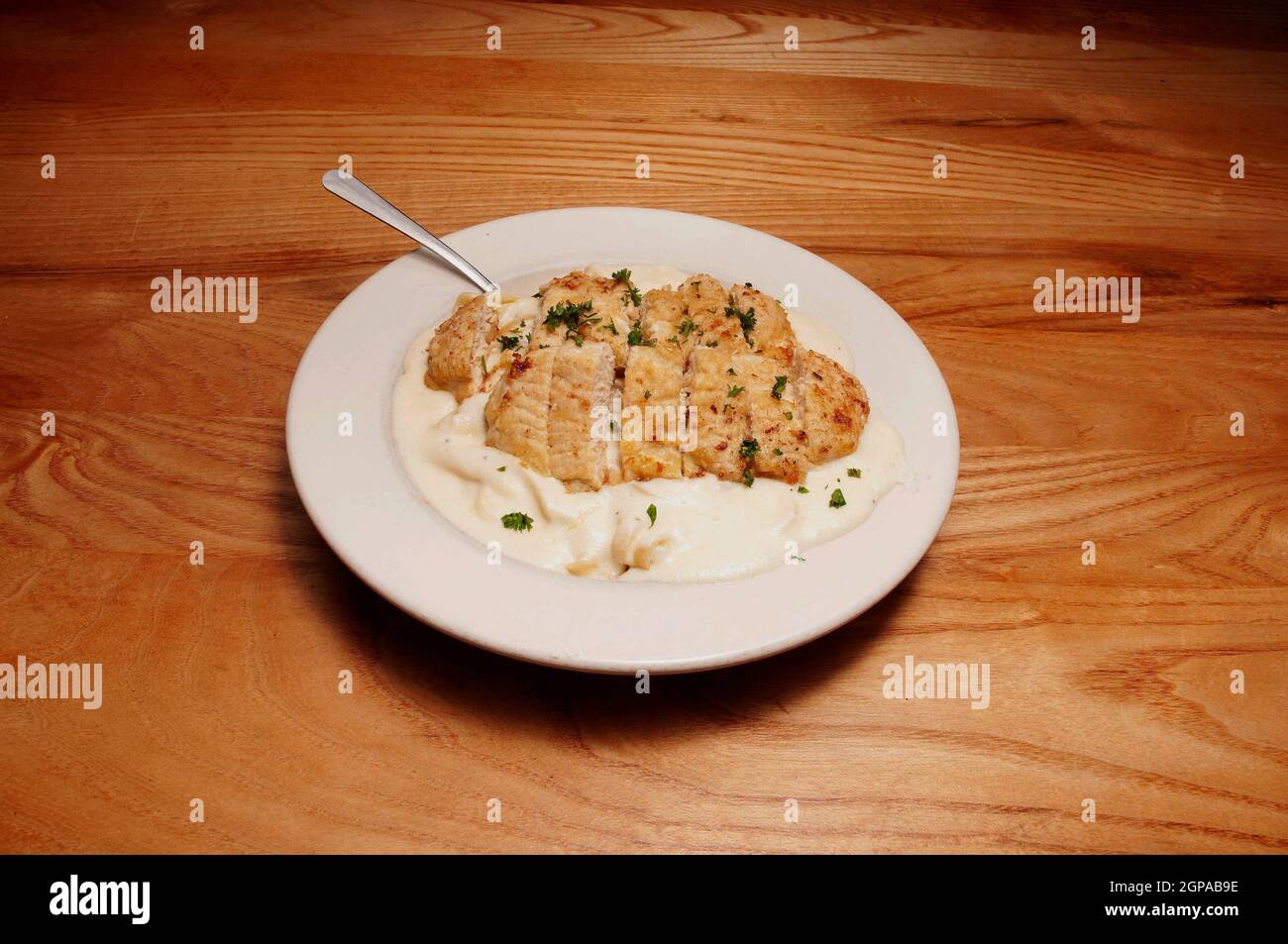 Traditional Italian cuisine dish known as chicken alfredo Stock Photo ...