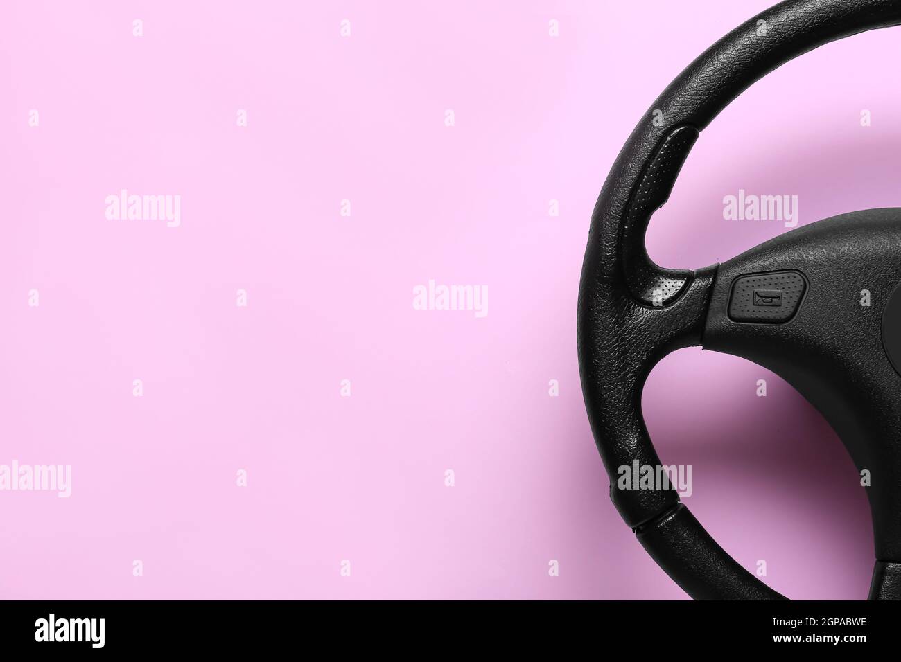 Black modern steering wheel on color background, closeup Stock Photo ...