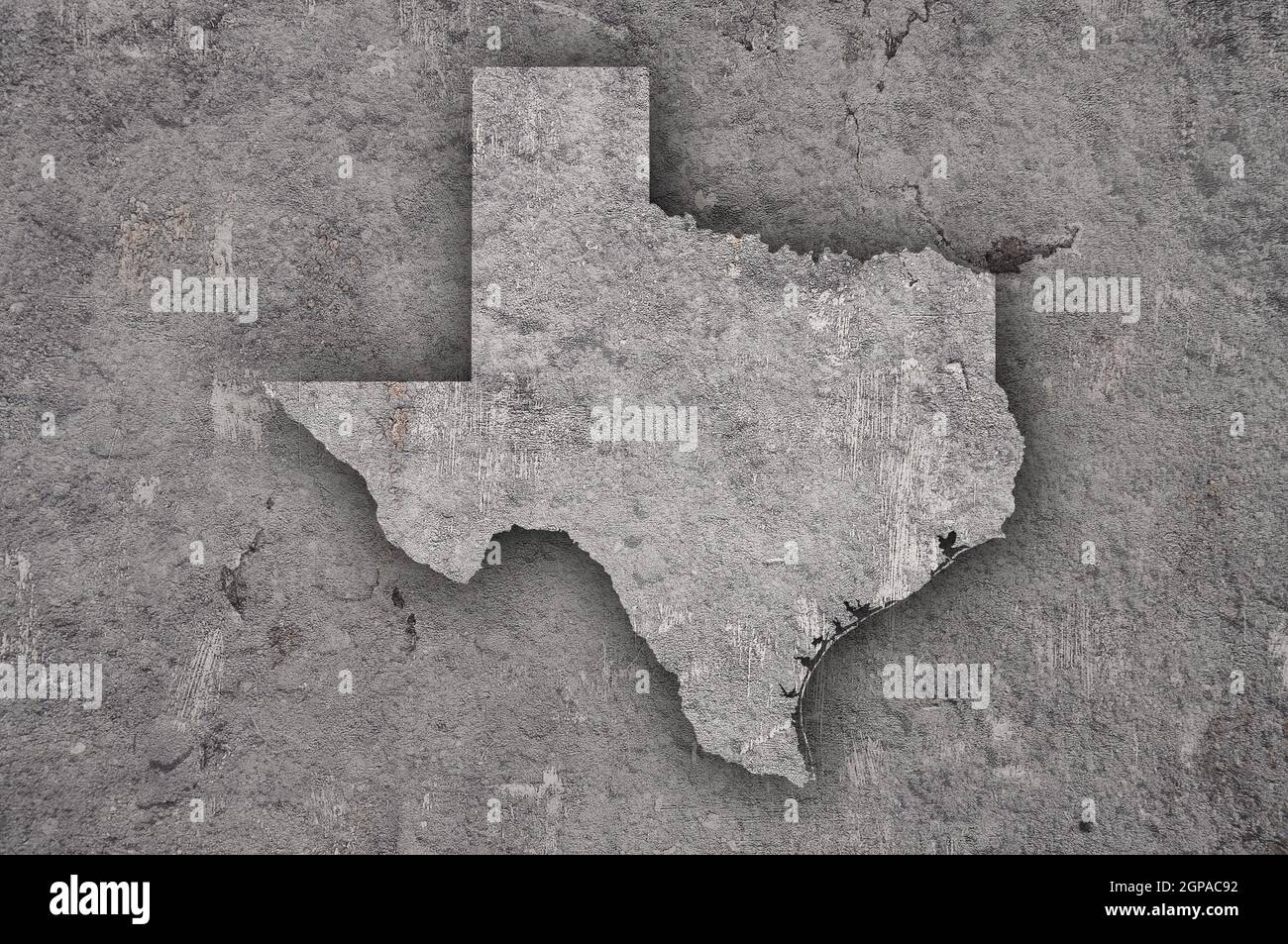 Map of Texas on weathered concrete Stock Photo - Alamy
