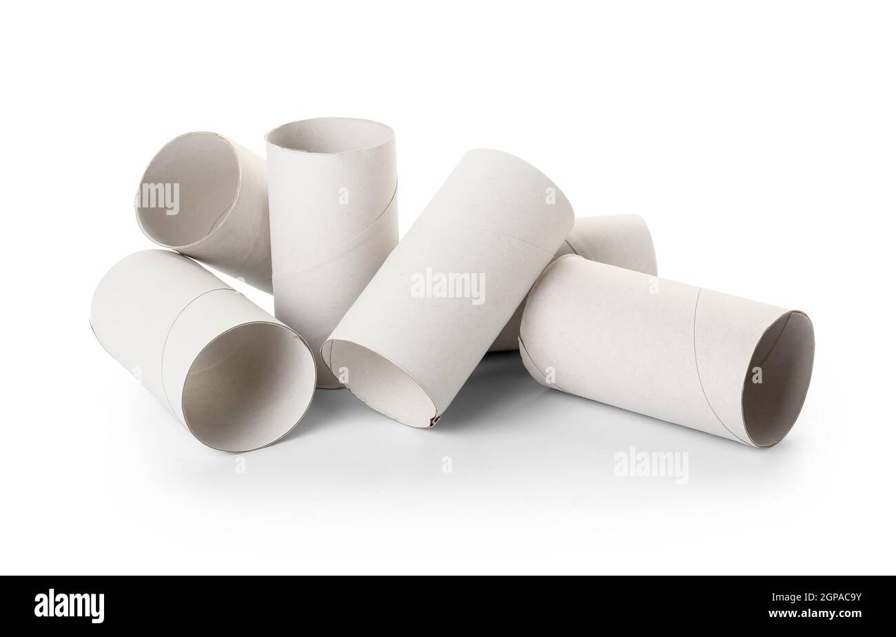 Heap of empty cardboard toilet roll tubes on white background Stock ...