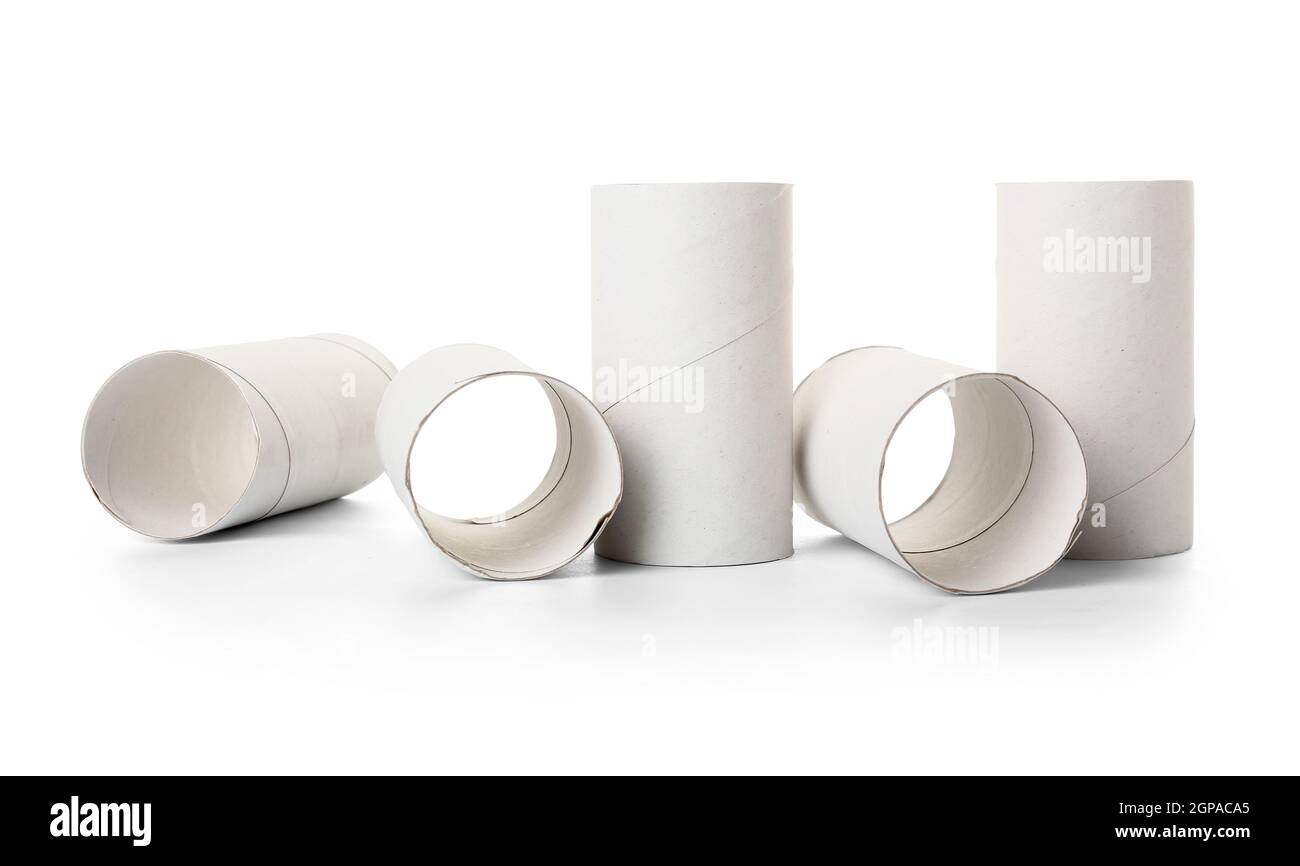 Empty cardboard tubes for toilet paper on white background Stock Photo ...