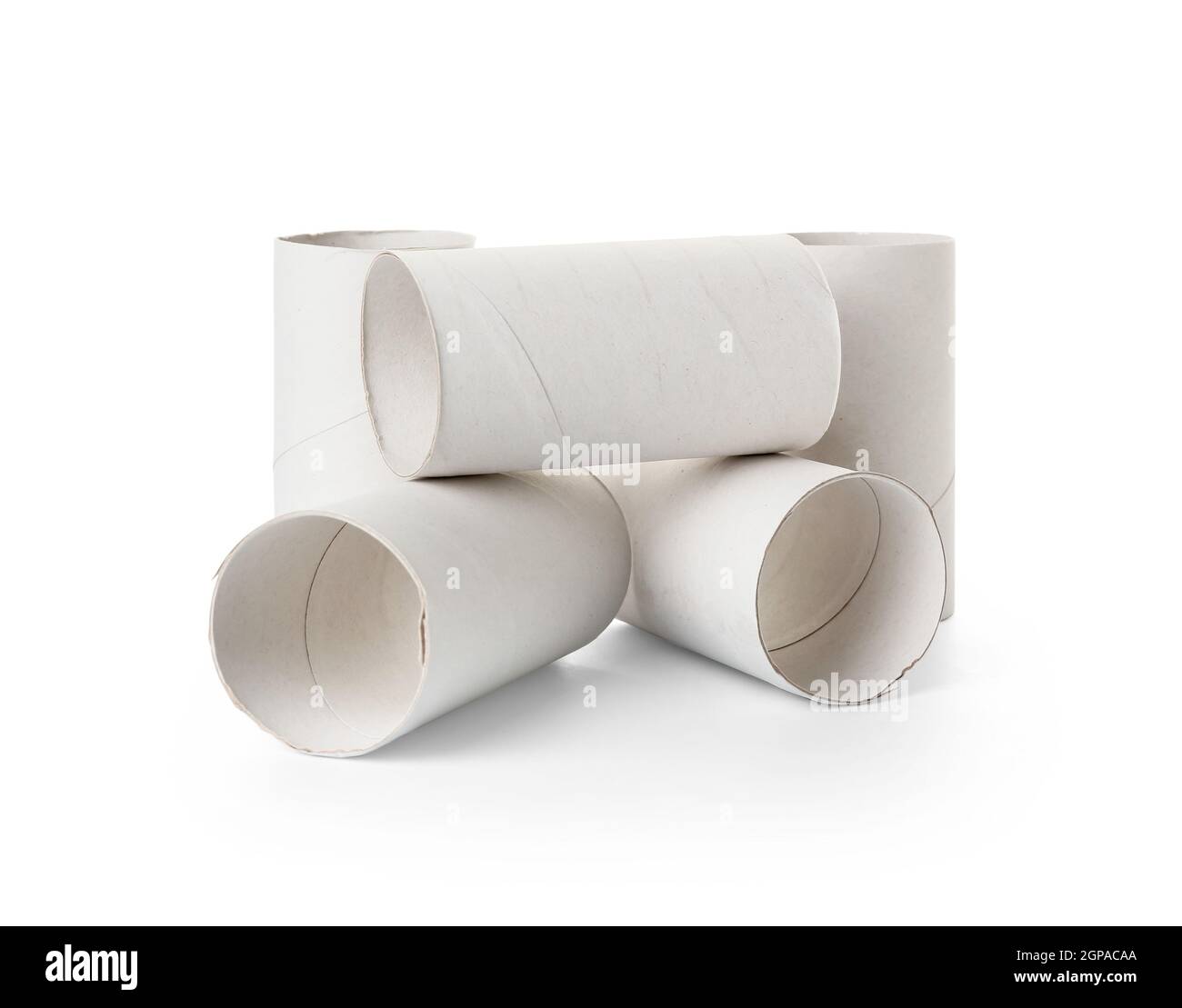 Stack of empty cardboard tubes for toilet paper on white background ...