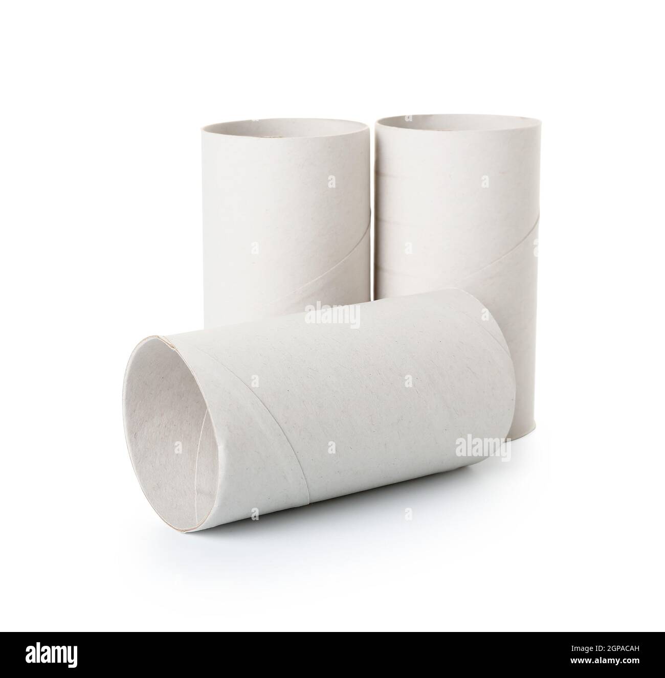 Empty cardboard tubes on white background Stock Photo - Alamy