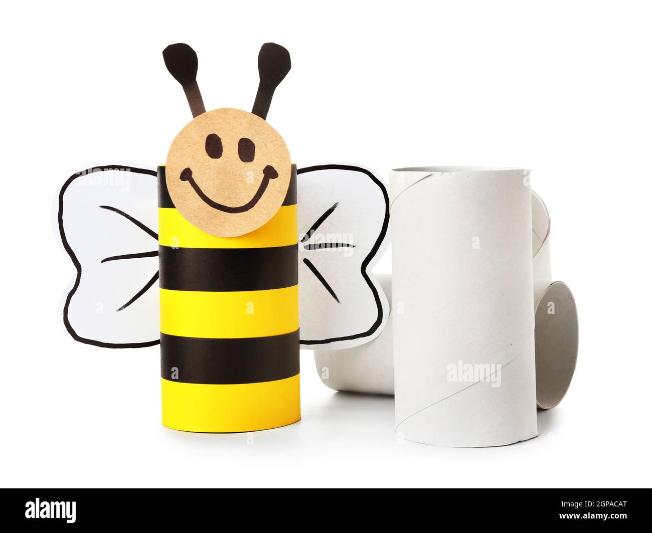 Cute bee made of cardboard and tubes for toilet paper on white ...