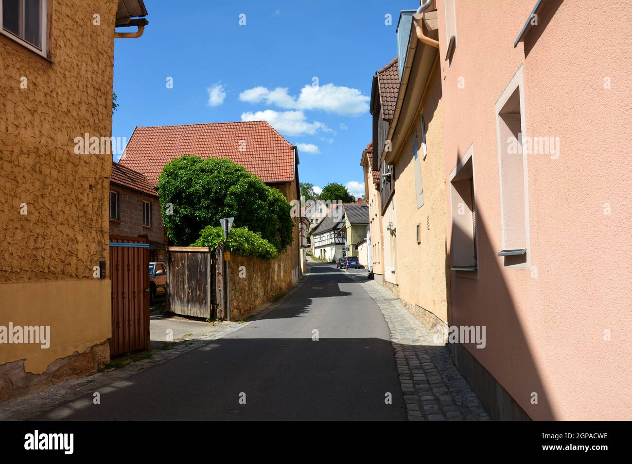 Small side street with houses in Ostheim vor der Rhön, Bavaria, Germany ...