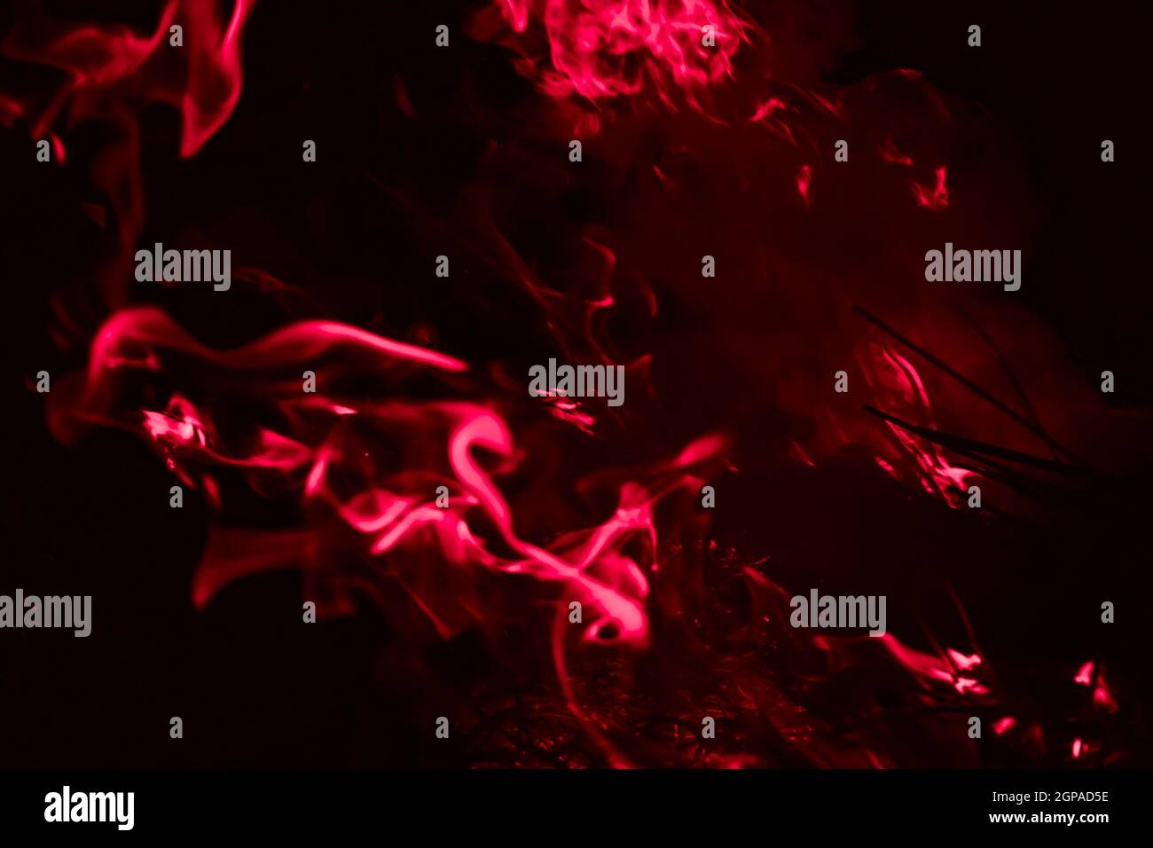 Fire. Burning of rice straw at night. A dark red flame Stock Photo - Alamy