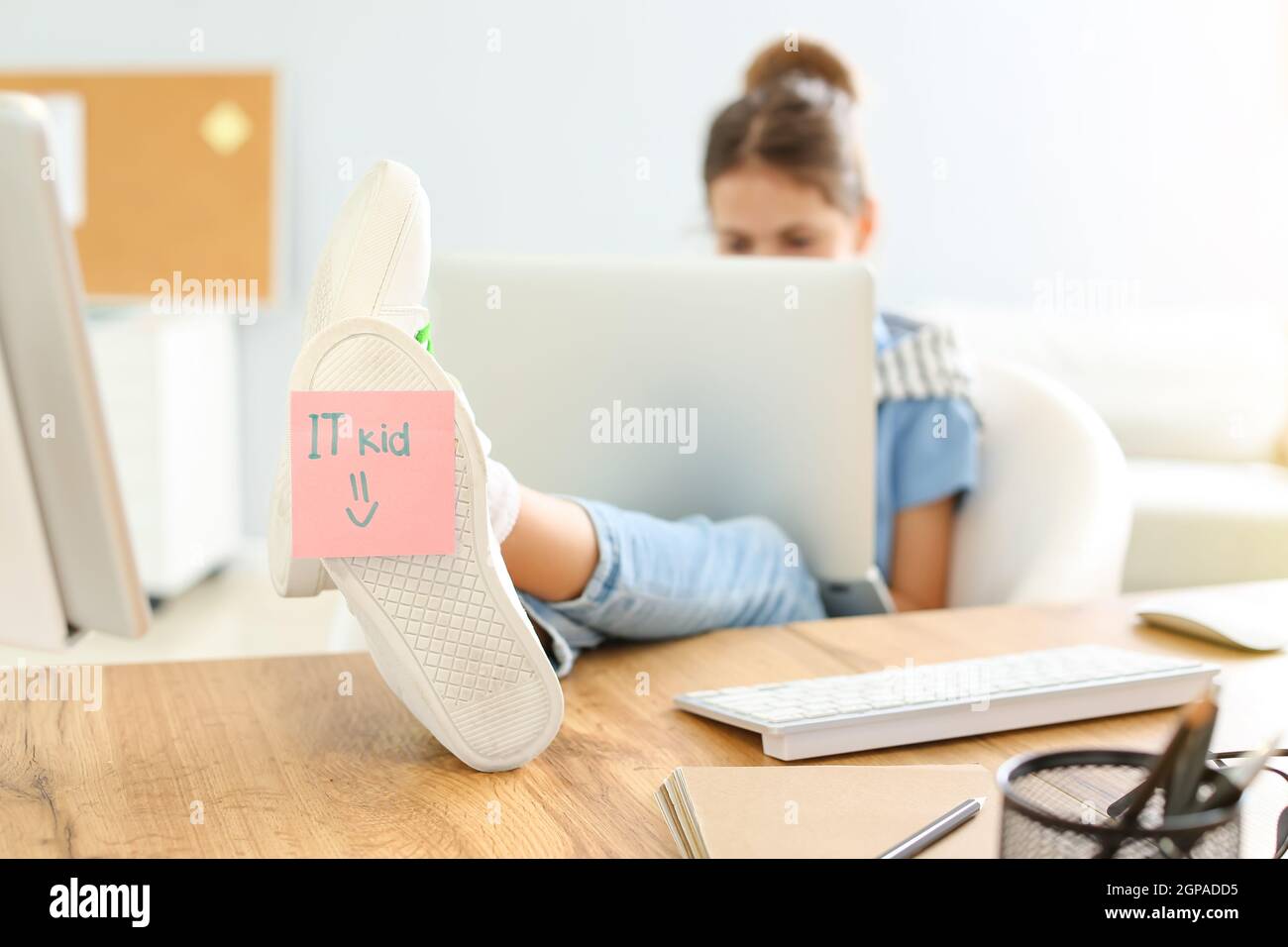 Little programmer and sticker with text IT KID in office Stock Photo ...