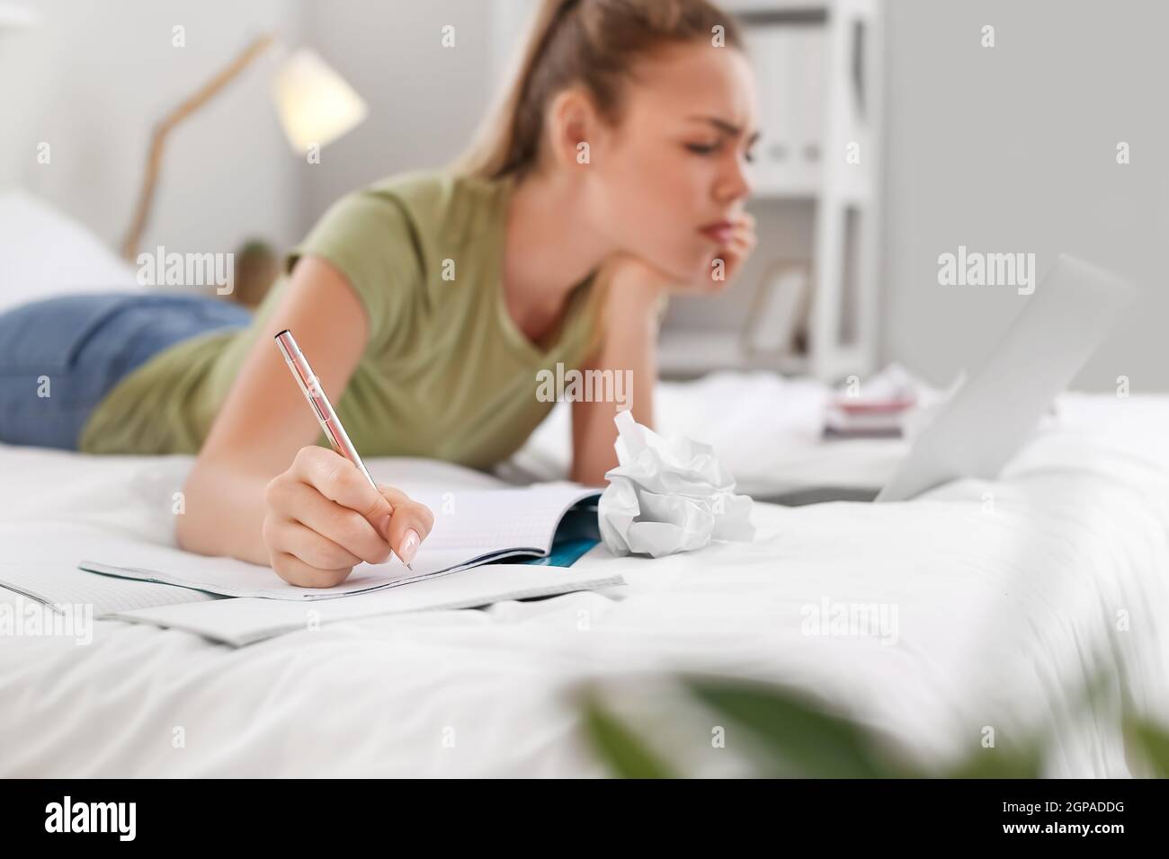 Female student preparing for exam at home Stock Photo - Alamy