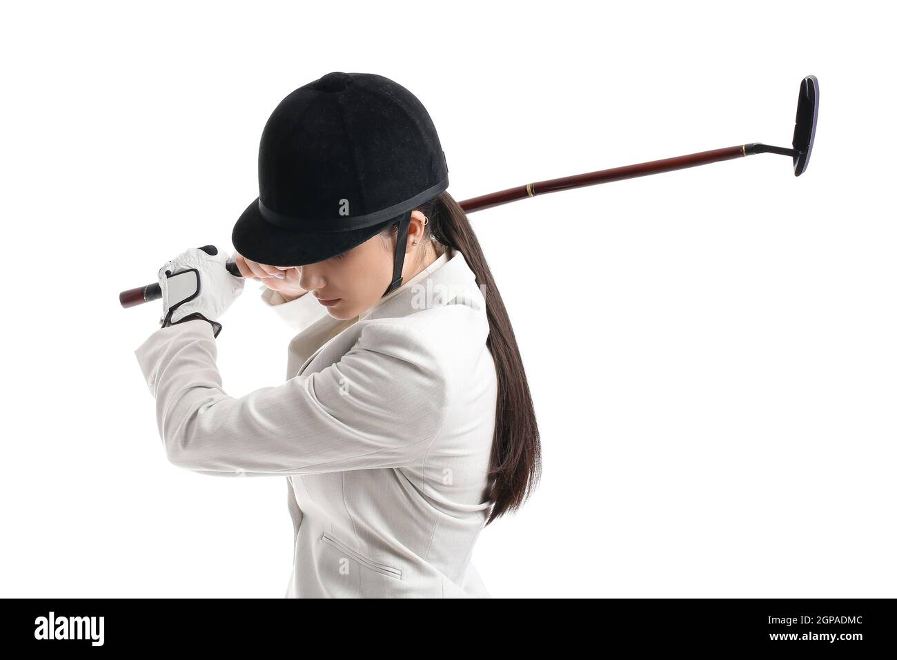Beautiful female polo player on white background Stock Photo - Alamy