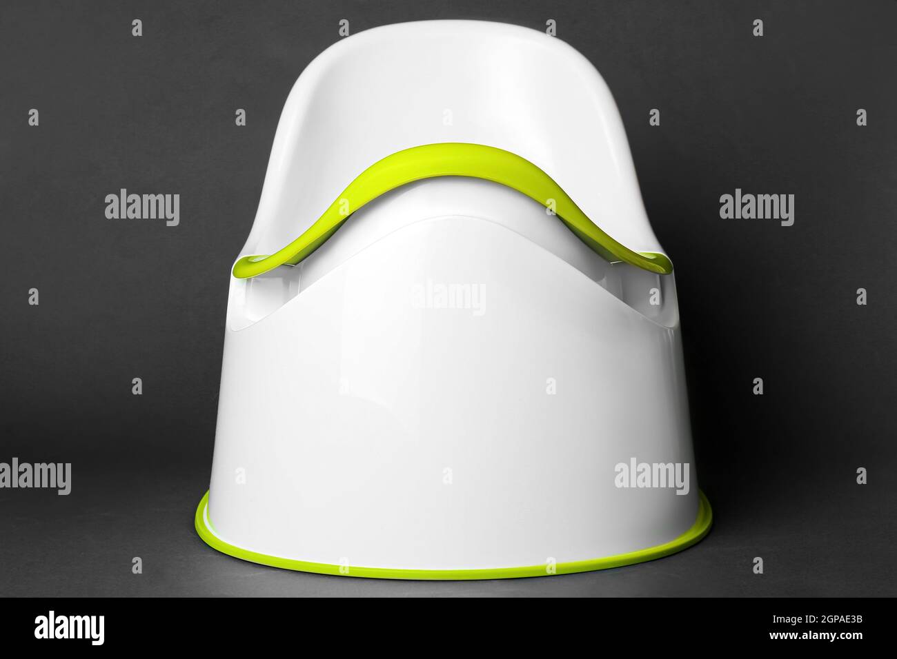 Potty on black background. Toilet training concept Stock Photo - Alamy