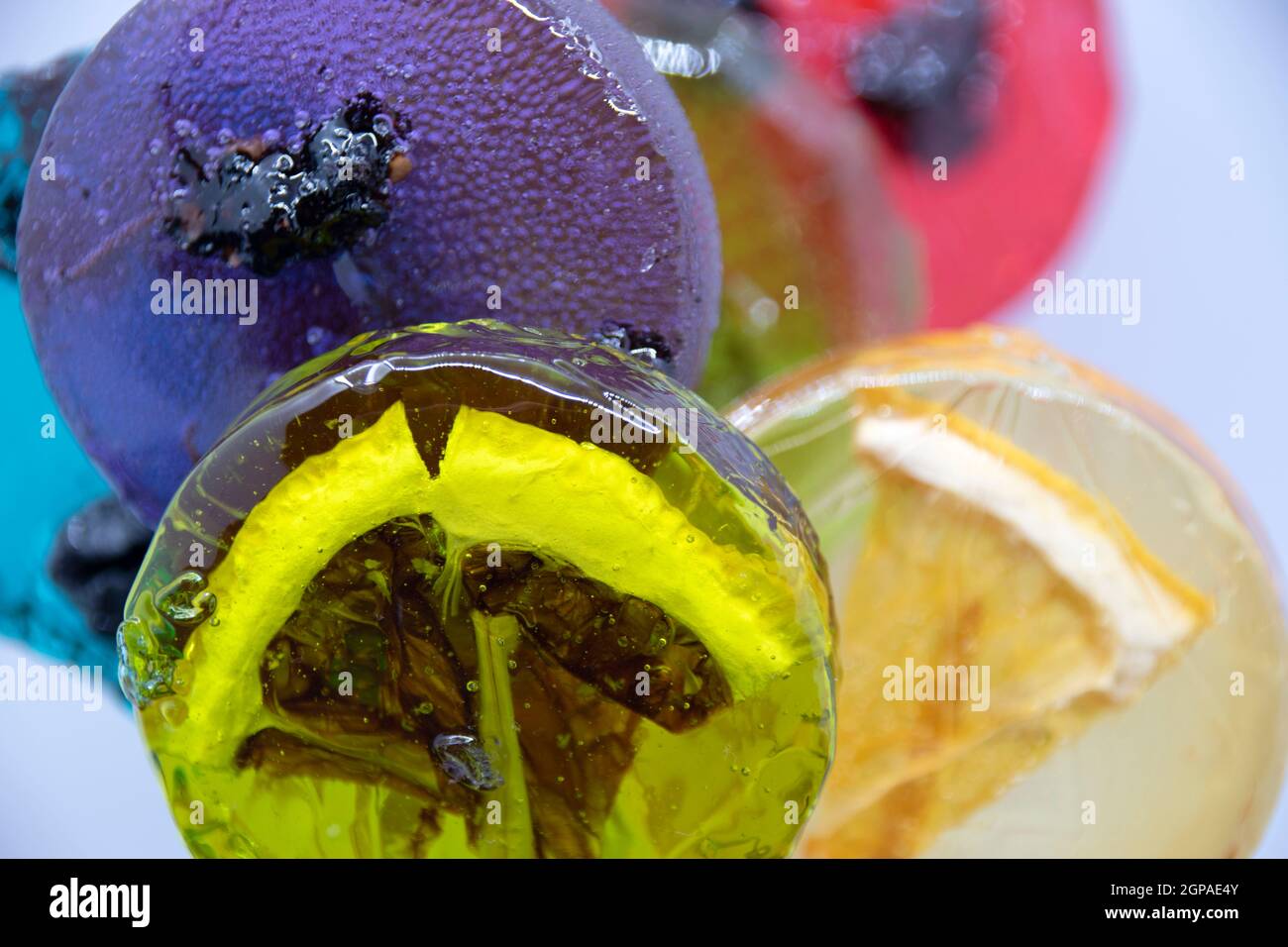 Fruit lollipops with different berries and fruits inside close-up Stock ...