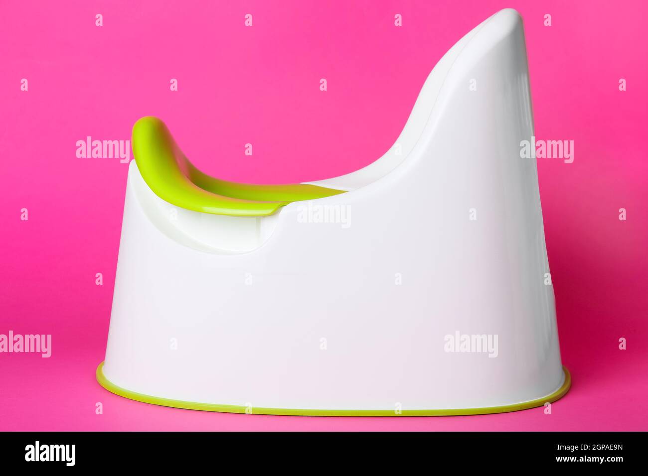 Potty on color background. Toilet training concept Stock Photo - Alamy