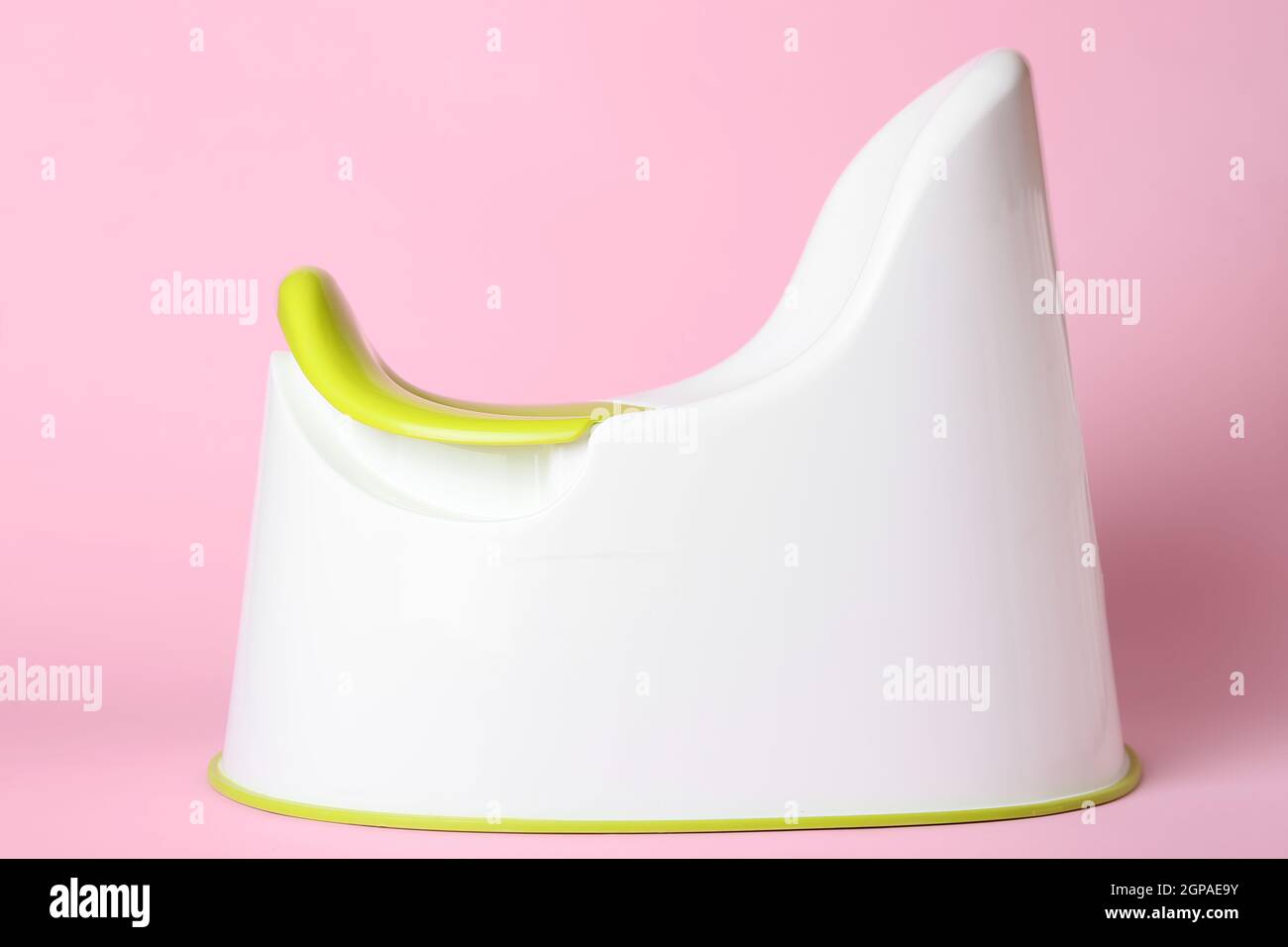 Potty on color background. Toilet training concept Stock Photo - Alamy