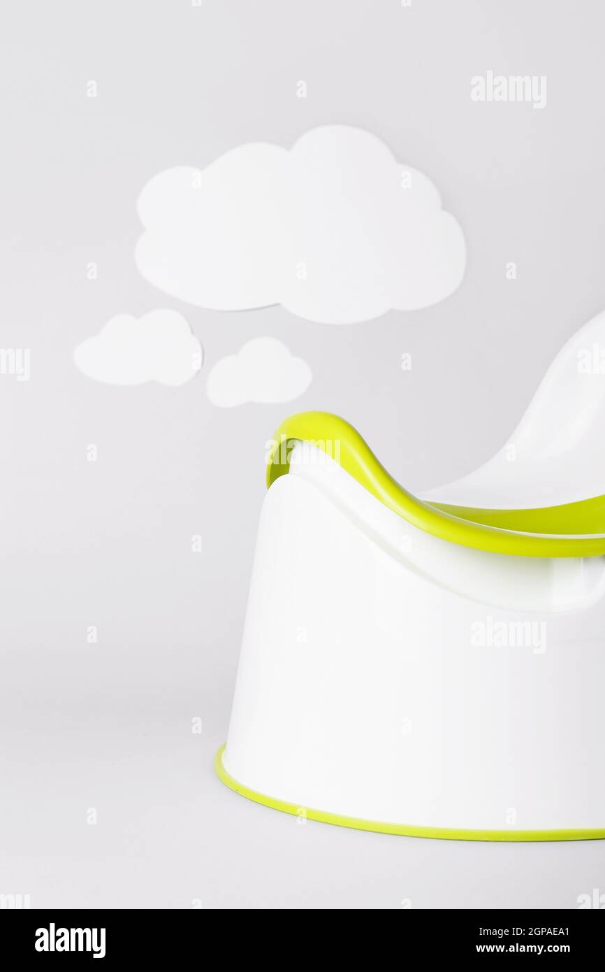 Potty on light background. Toilet training concept Stock Photo - Alamy