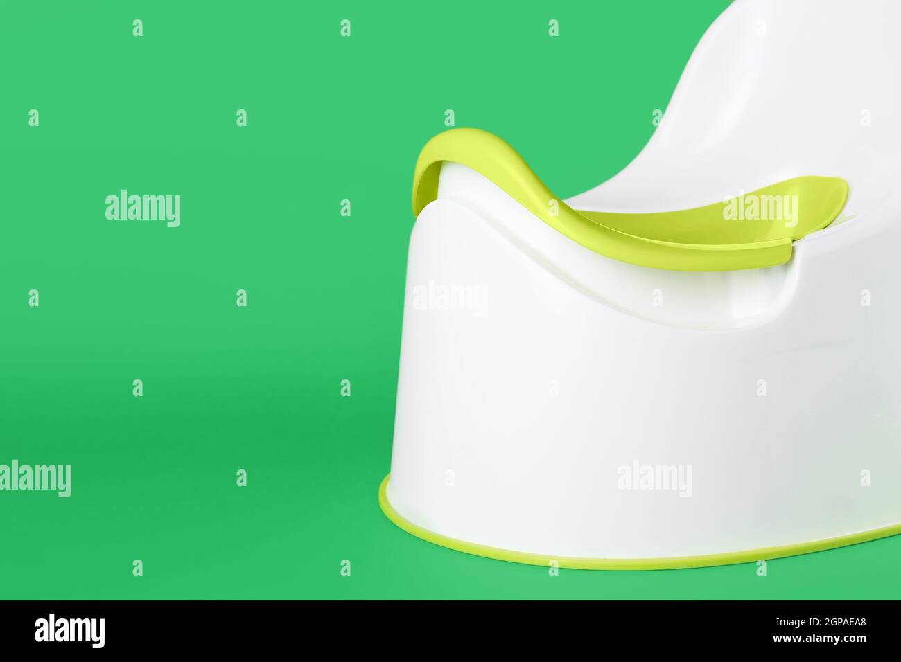 Potty on color background. Toilet training concept Stock Photo - Alamy