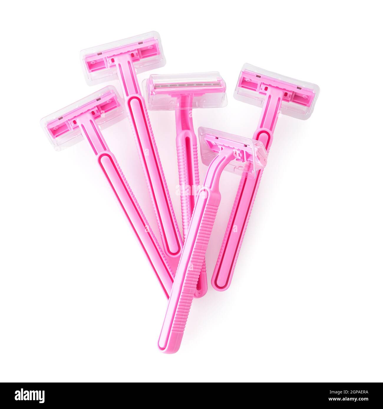 Many pink razors on white background Stock Photo - Alamy
