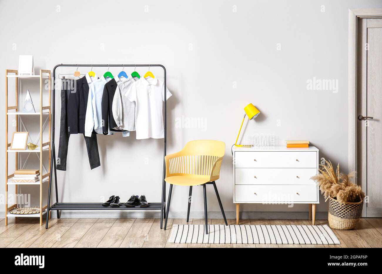 Interior of stylish room with school uniform Stock Photo - Alamy
