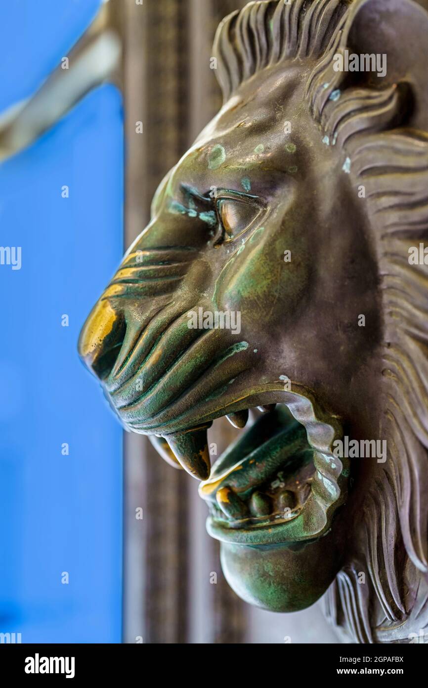 Classical lion head ornament on the rear bronze doors of the Parthenon ...