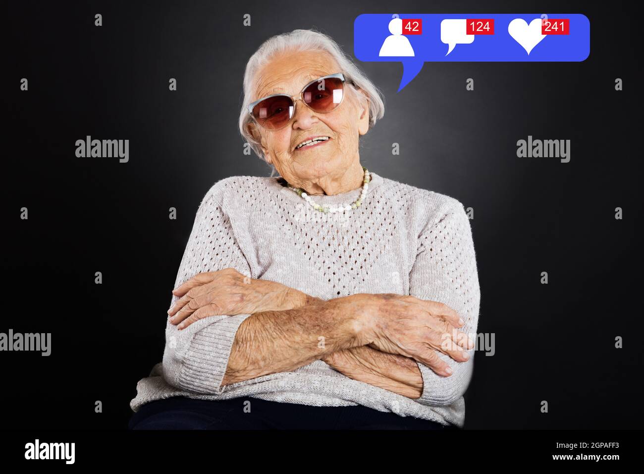 Retired Grandma On Social Media With Hearts And Likes Stock Photo - Alamy