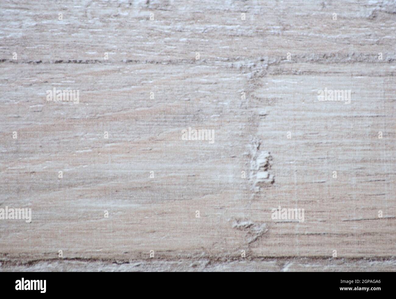 The surface of the old light wood with traces of rough sanding and the ...