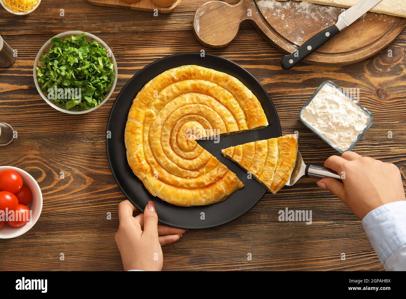 Woman taking tasty snack puff hi-res stock photography and images - Alamy